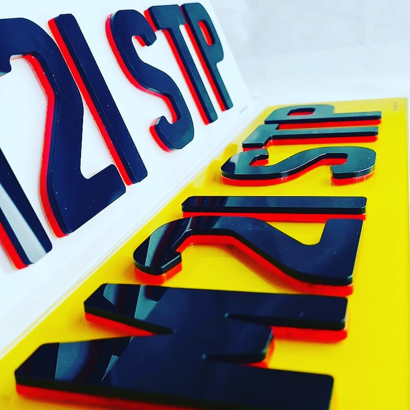 Red 4D Neon plates with black 4D on top – Crystal Plates