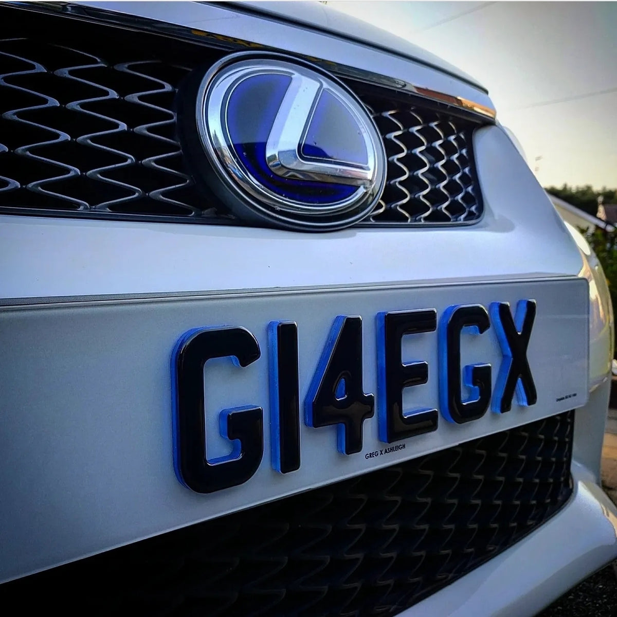 Double stacked neon blue 4D plates for this Lexus – Crystal Plates
